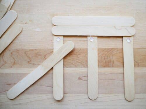 DIY Hanging Bird Feeder from Craft Sticks